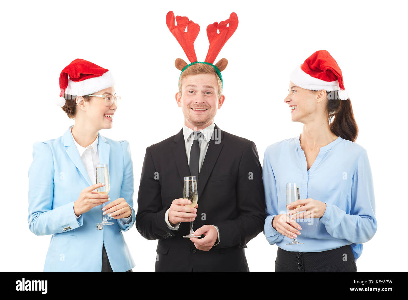 Portrait of office workers wearing Santa hats and reindeer headbands ...