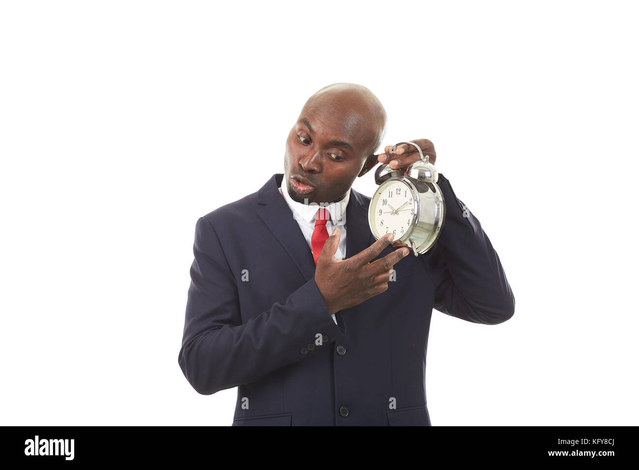 Portrait of young African manager holding alarm clock Stock Photo - Alamy