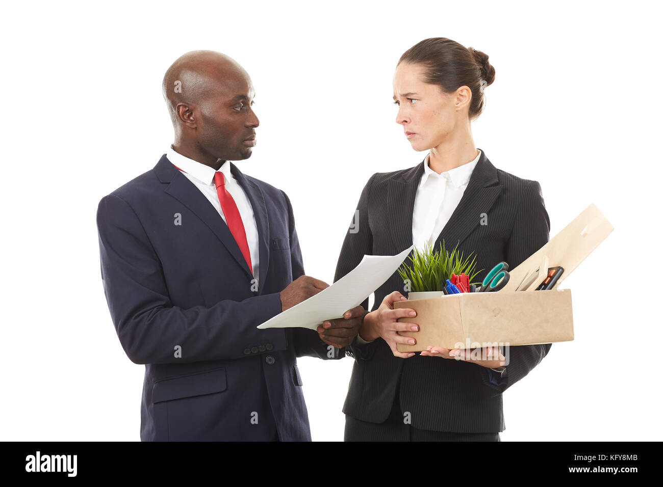 Portrait of male employer and female employee holding box with personal ...