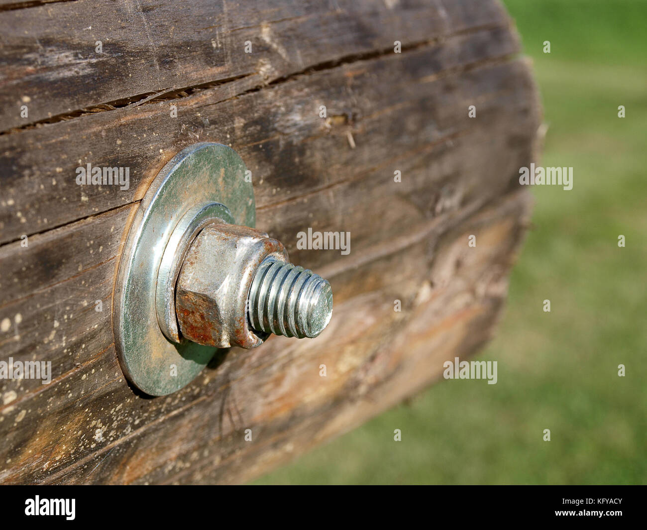 Wood beams connected by metal screw and nut Stock Photo - Alamy