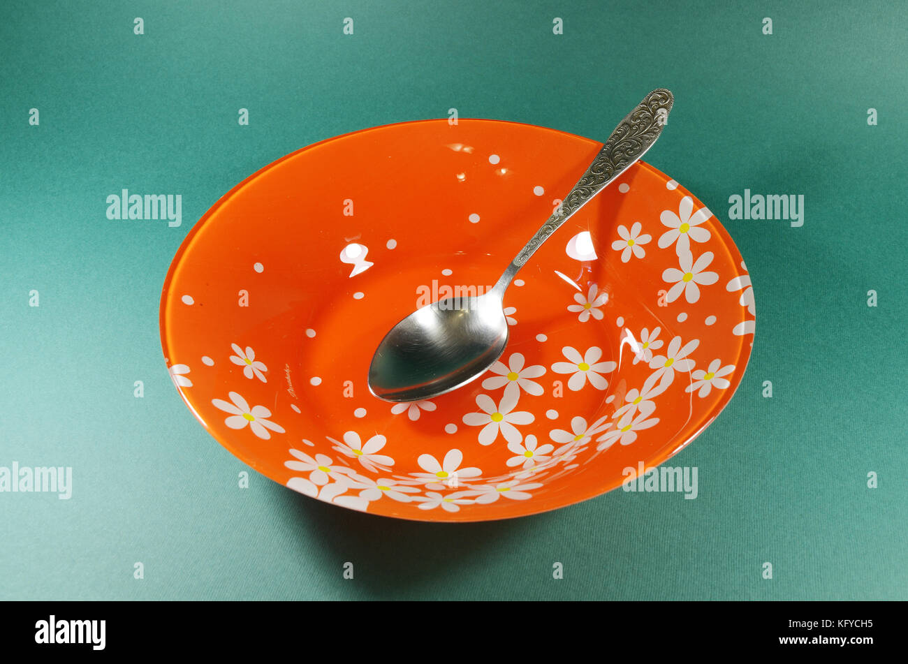 In the bowl lies a set of spoons for eating Stock Photo - Alamy