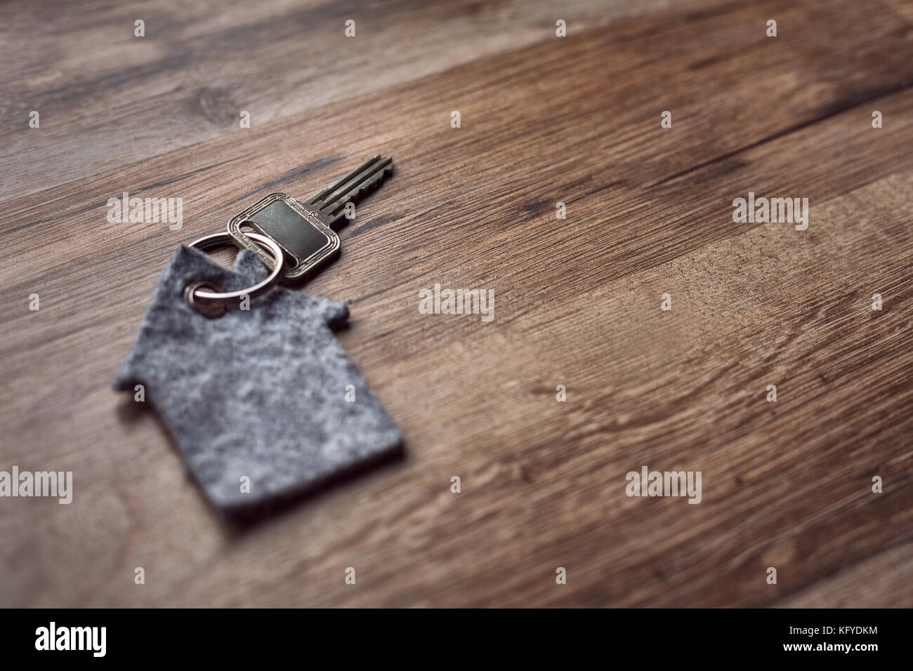 Latchkey with key chain Stock Photo - Alamy