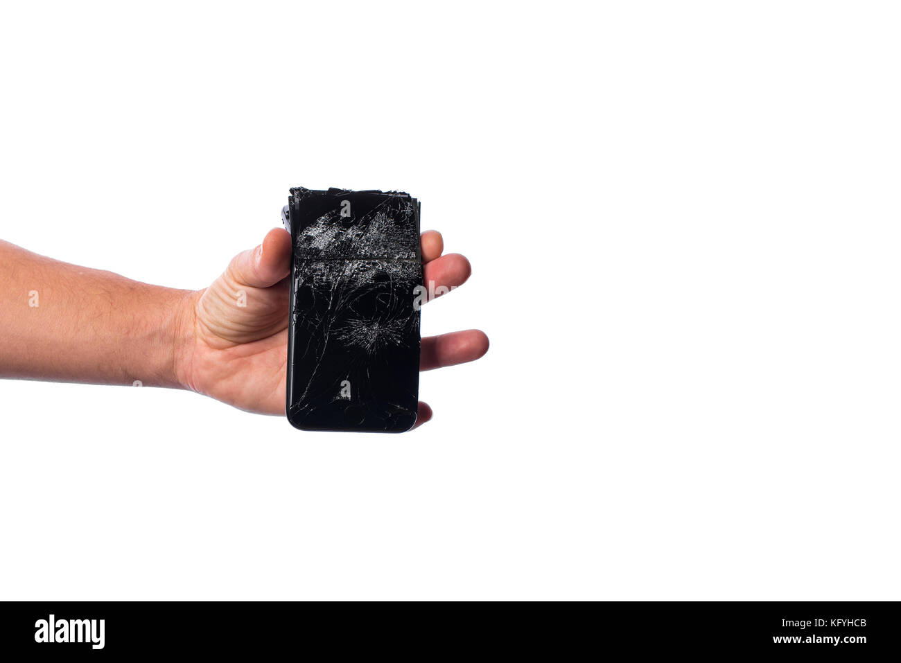 The hand holds a broken mobile phone, a white background, a business ...
