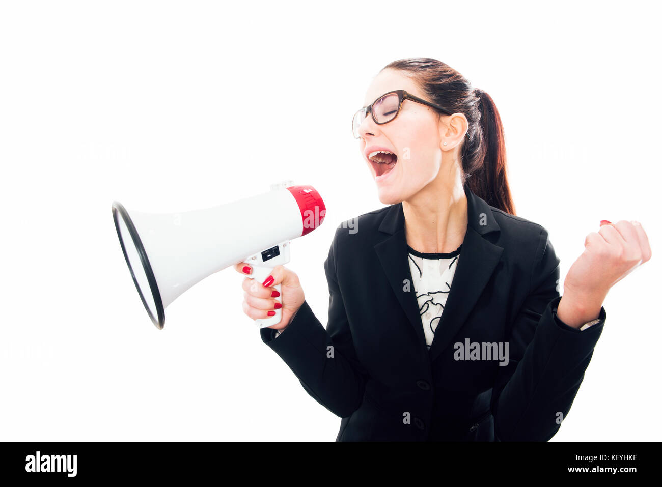 Businesswoman yelling through a megaphone Stock Photo - Alamy