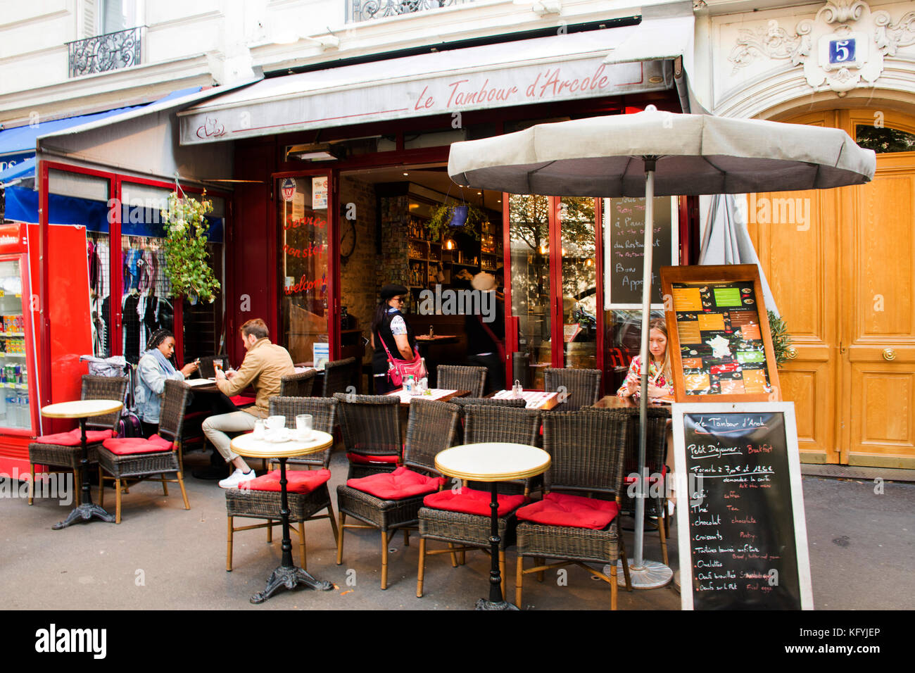 French people and foreigner travelers use service and eat, drink food ...