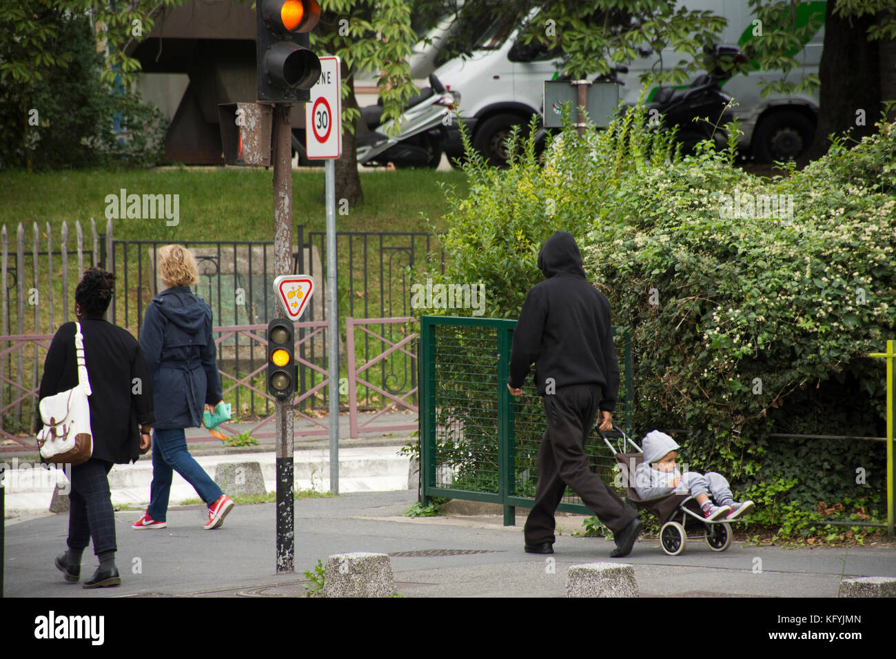 African-French people walking on pedestrian go to subway station at ...