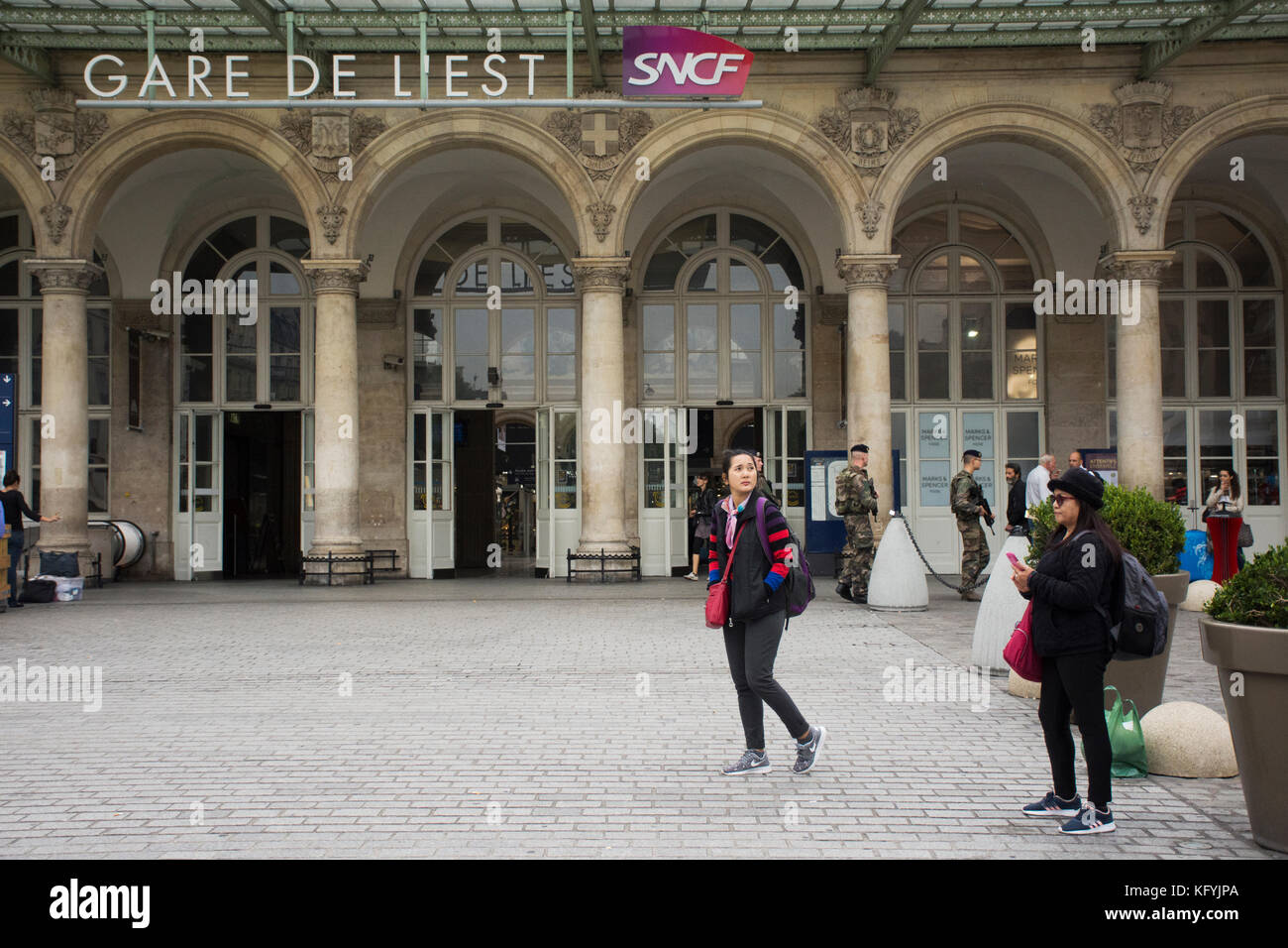 French people and foreigner travelers walking in and out at Gare de ...