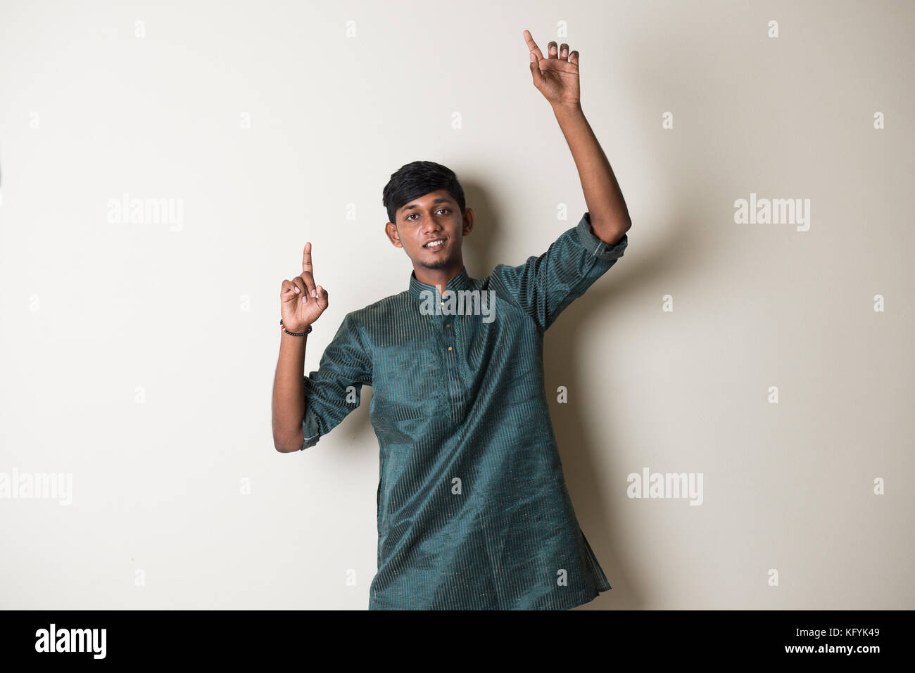 teenage indian male in traditional dress dancing Stock Photo - Alamy