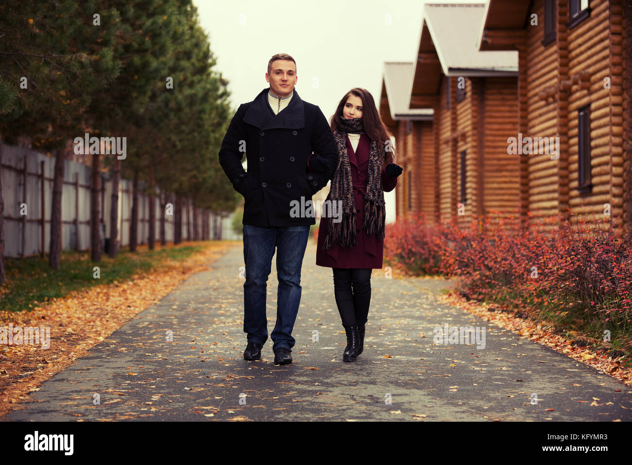 Young fashion couple walking outdoor Stock Photo - Alamy