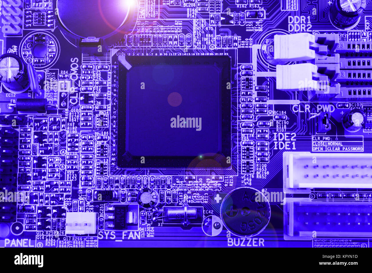 Integrated semiconductor microchip on blue circuit board representative ...