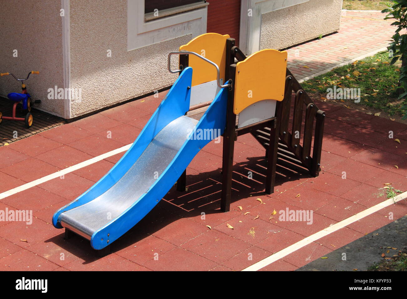 Children's slide in a public park Stock Photo - Alamy