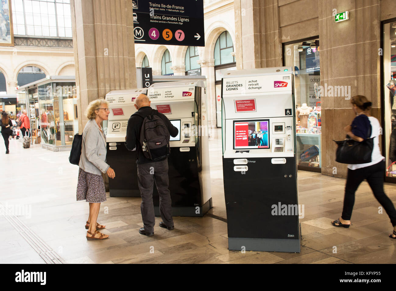 French people and foreigner travelers buy ticket from auto vending ...