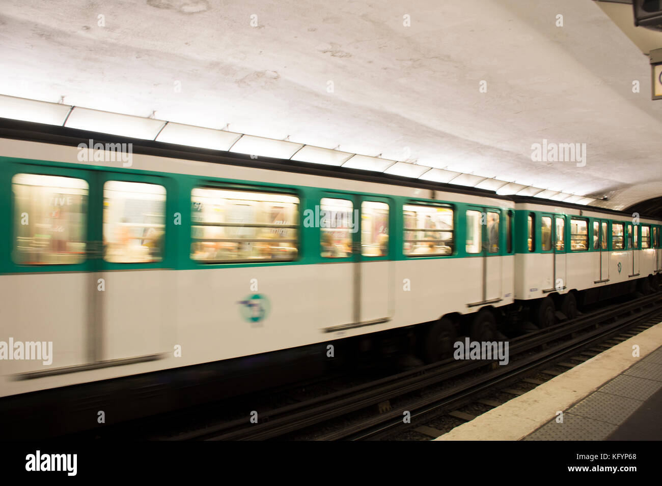 French people and foreigner travelers sitting inside of subway for ...