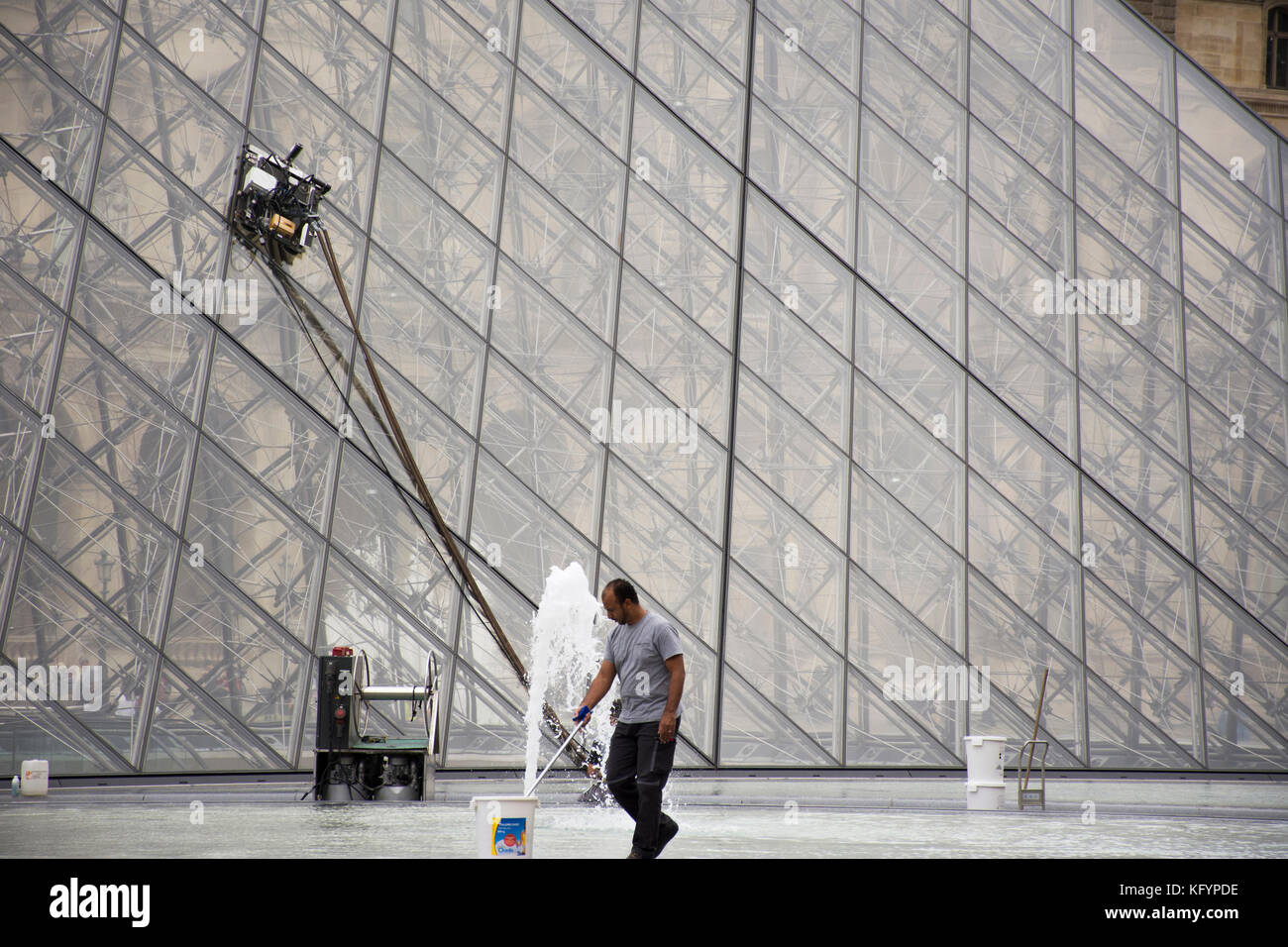 Louvre museum robot cleaning glass pyramid hi-res stock photography and ...