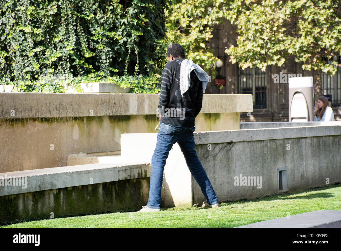 African-French people peeing at outdoor near Courtyard of Hotel de ...