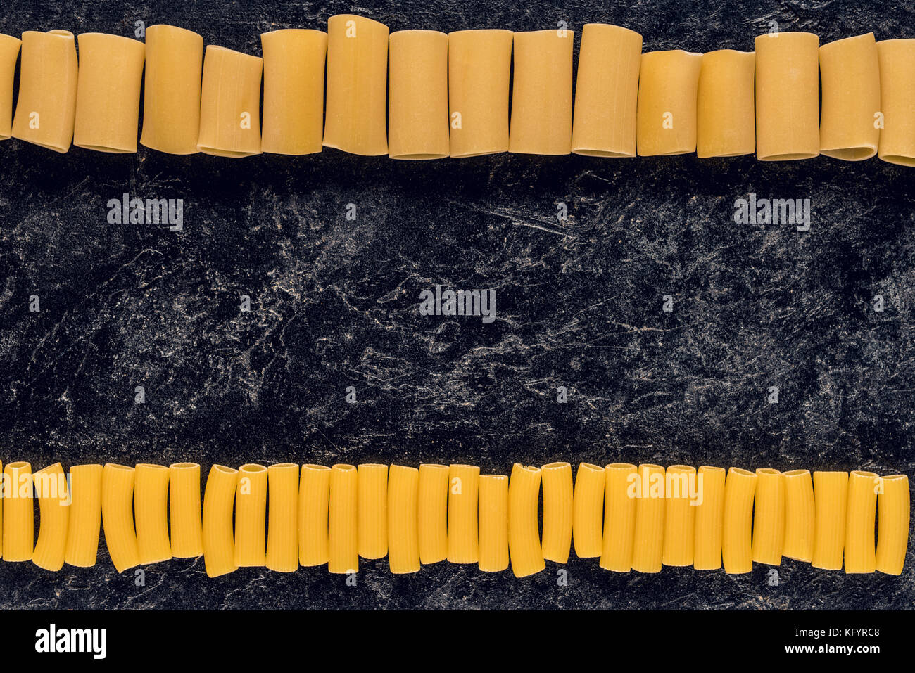raw pasta in rows Stock Photo - Alamy