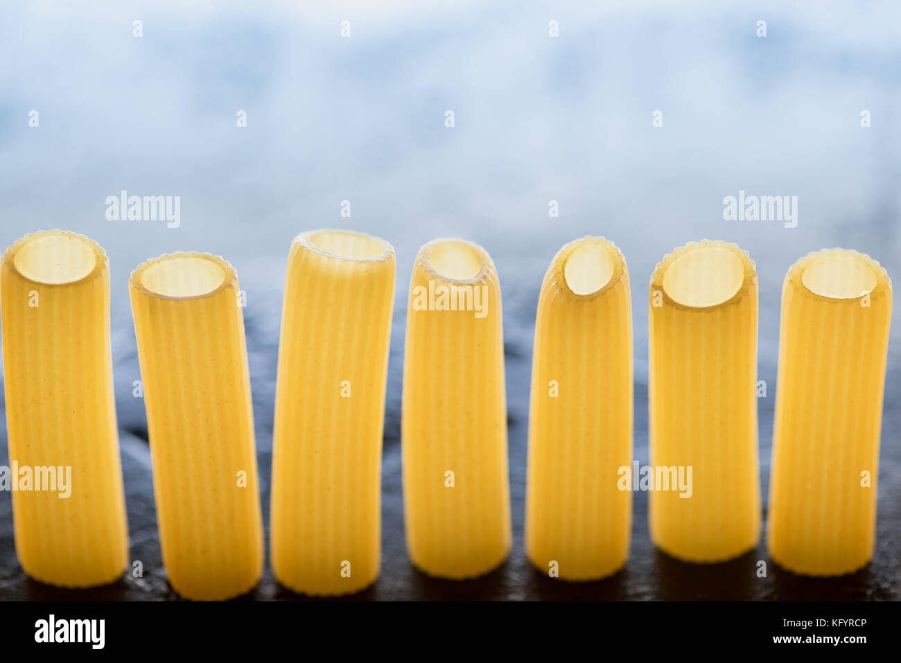 pasta standing in row Stock Photo - Alamy