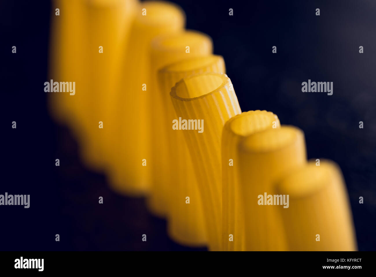 pasta standing in row Stock Photo - Alamy
