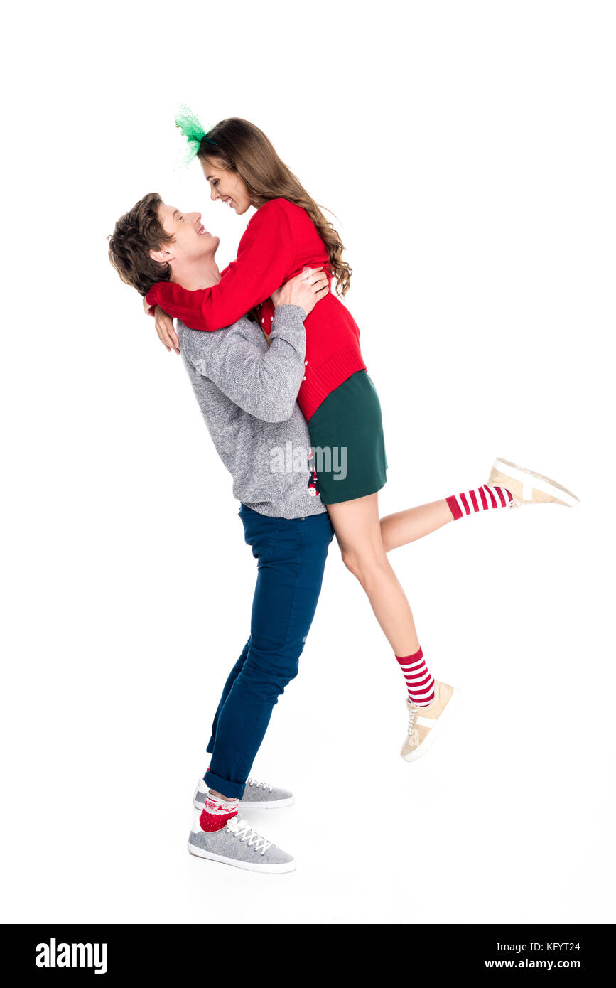man holding girlfriend Stock Photo - Alamy