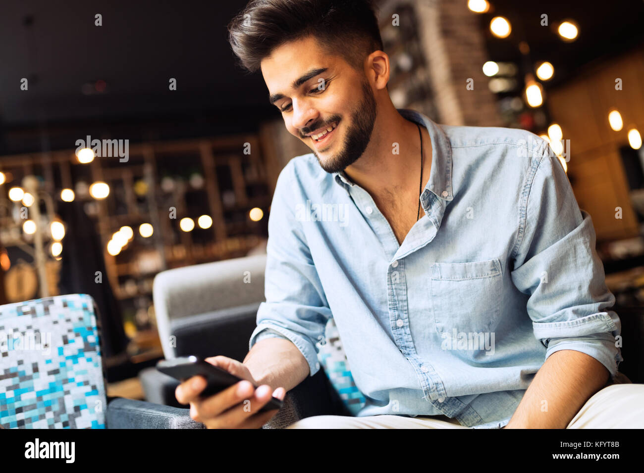 Handsome young man happy joyful hi-res stock photography and images - Alamy