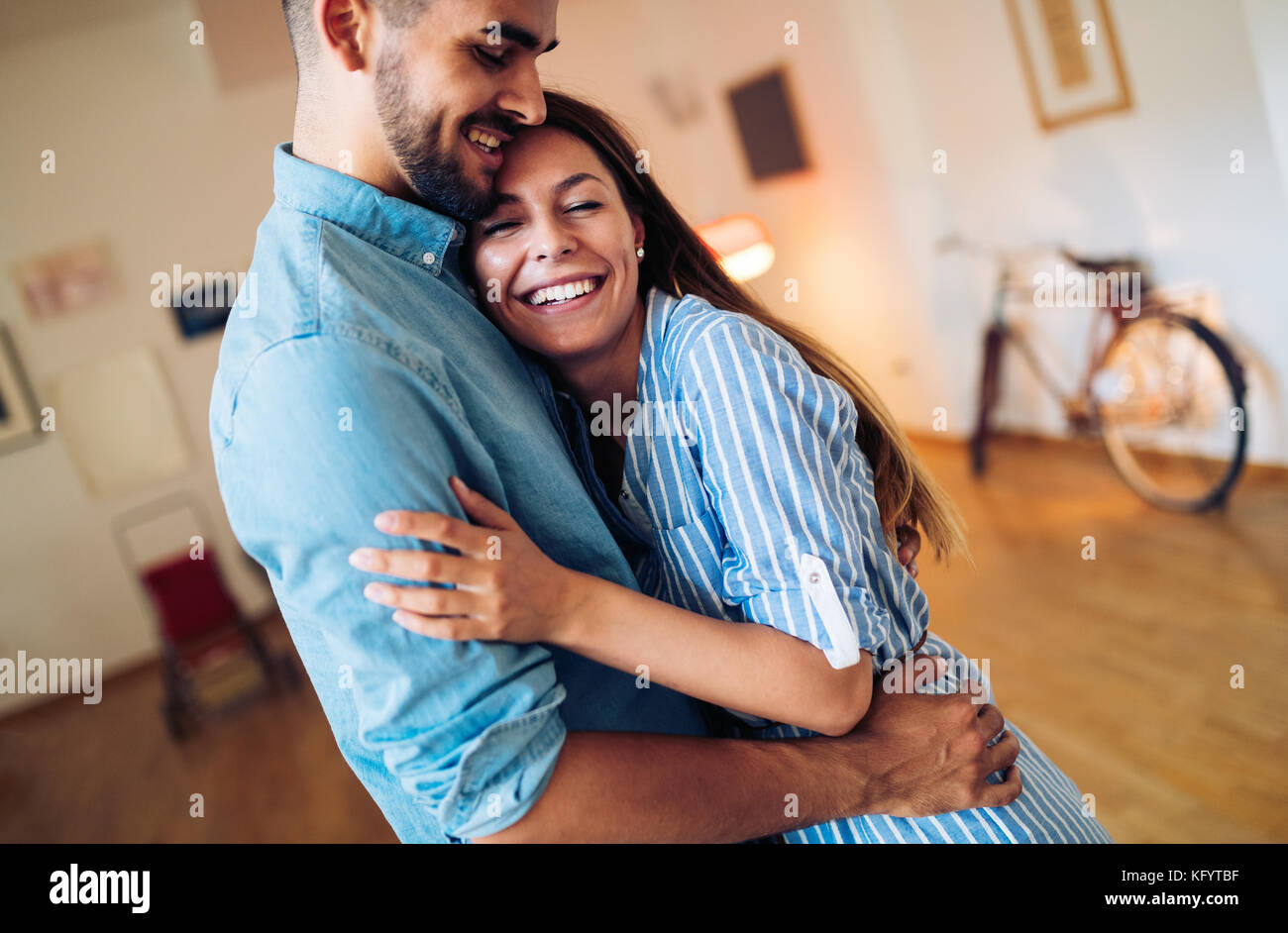 Beautiful couple hugging Stock Photo - Alamy