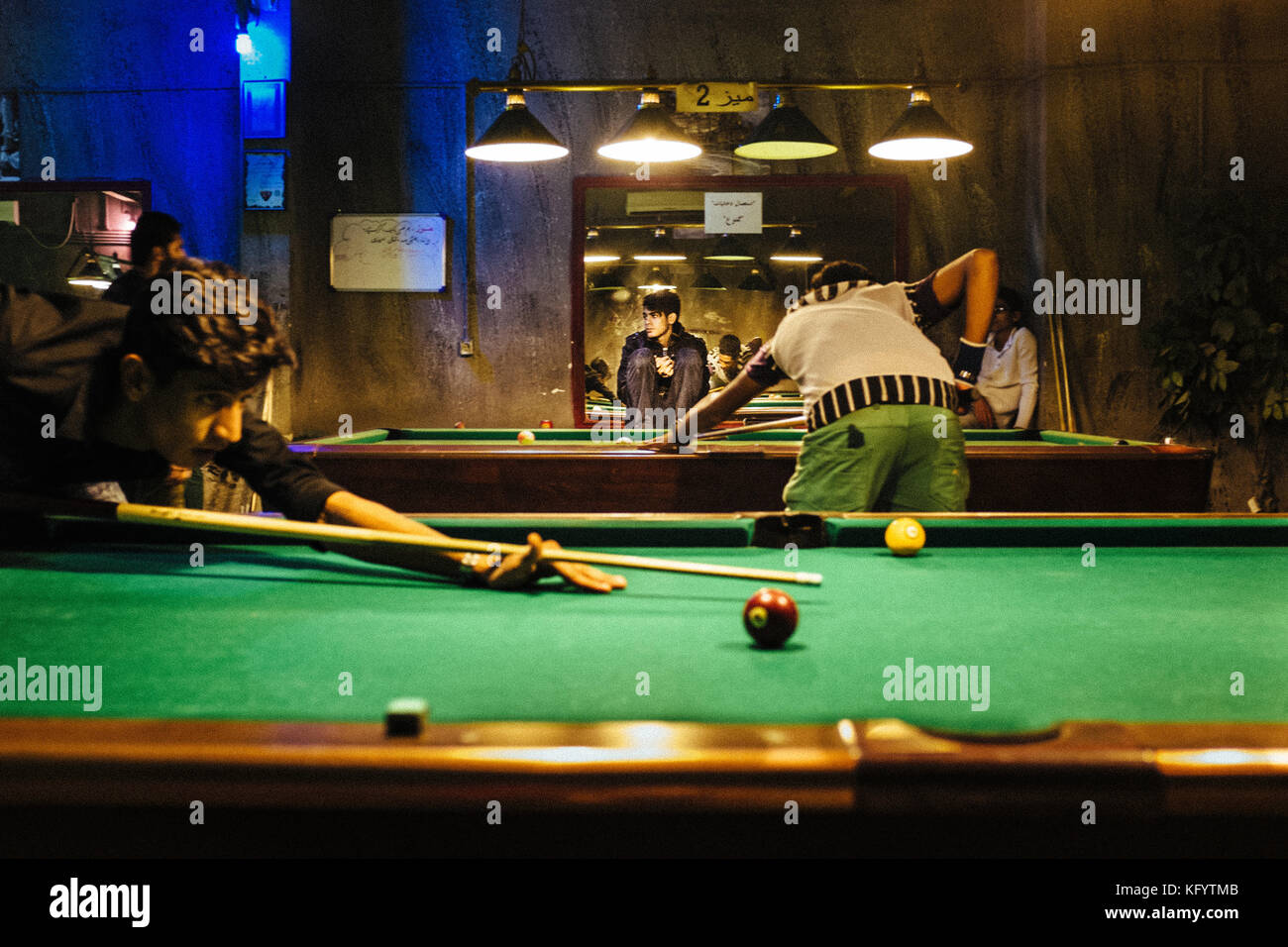 Bandar Abbas, Iran - December 14, 2013. Young Iranian men are playing ...