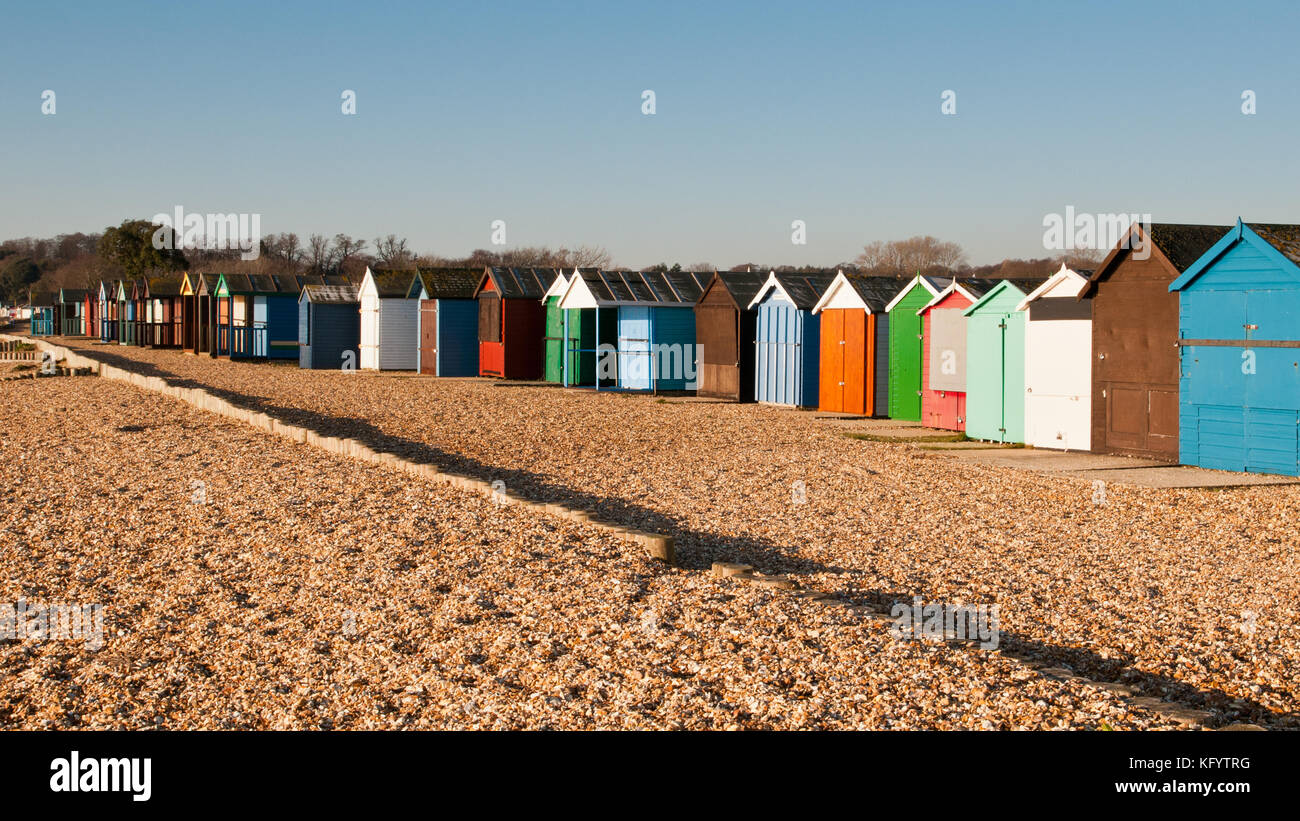 A row of colourful beach huts ready for the holiday season Stock Photo ...