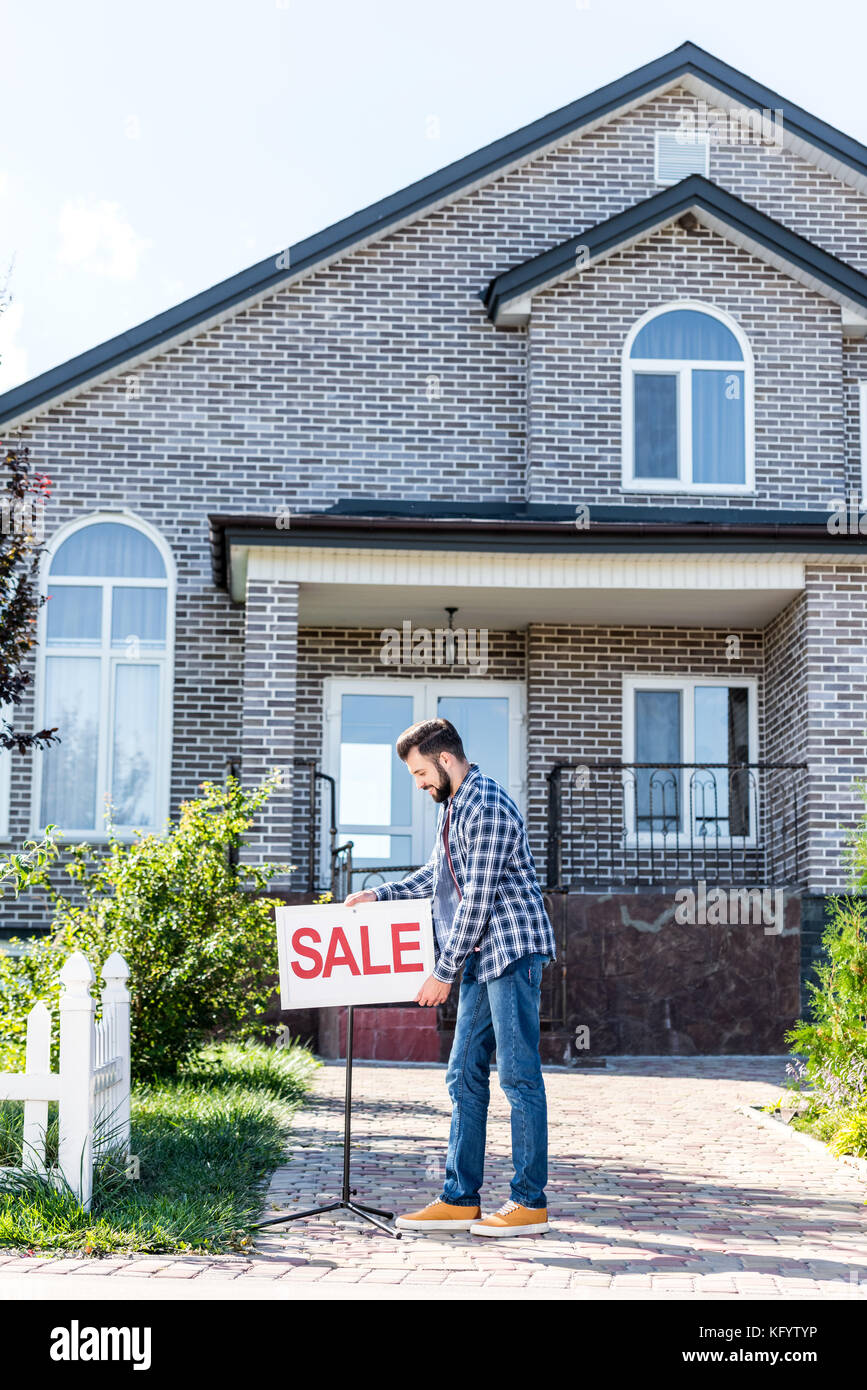 man selling his house Stock Photo - Alamy