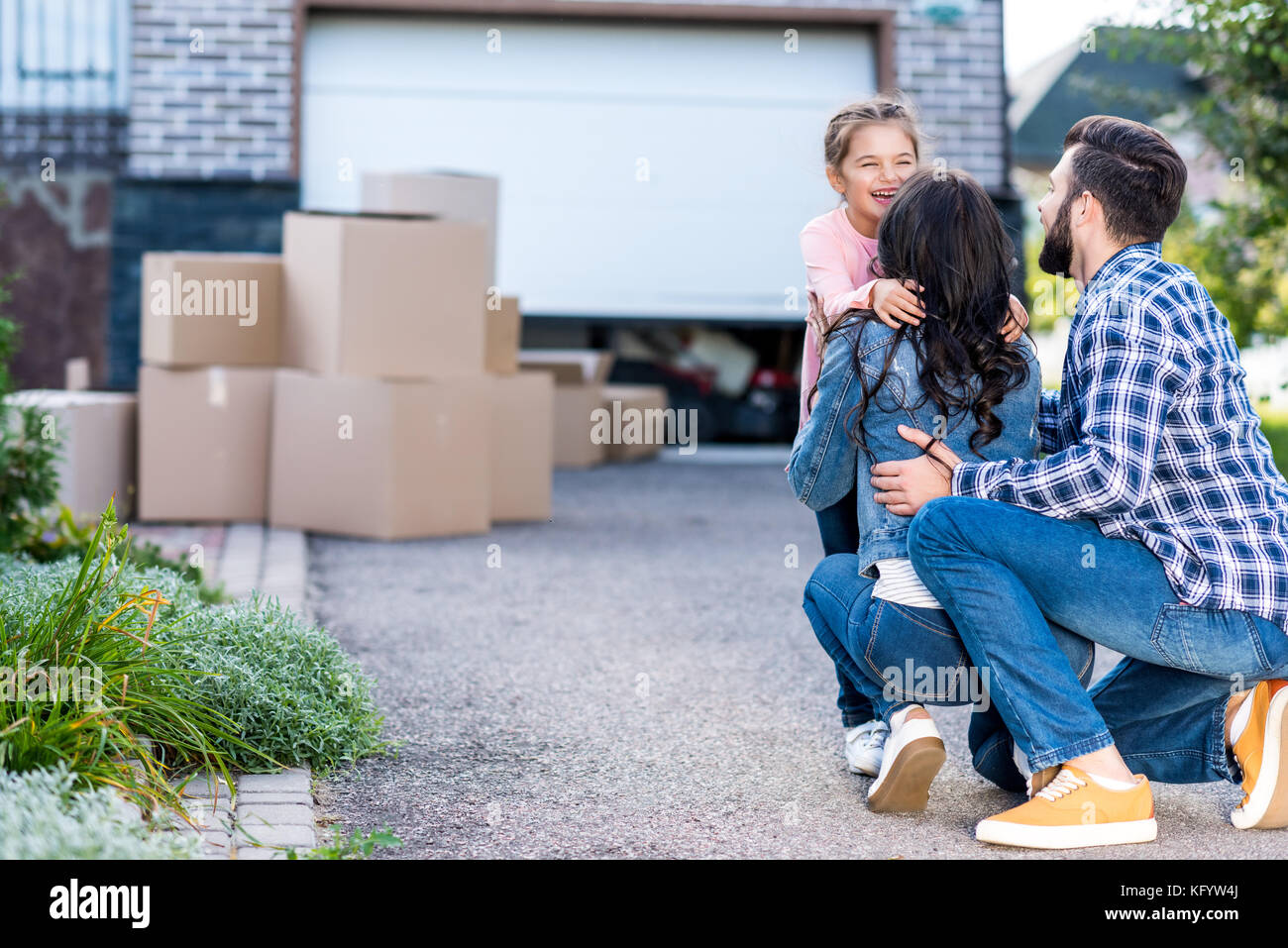 happy girl having fun with parents Stock Photo - Alamy