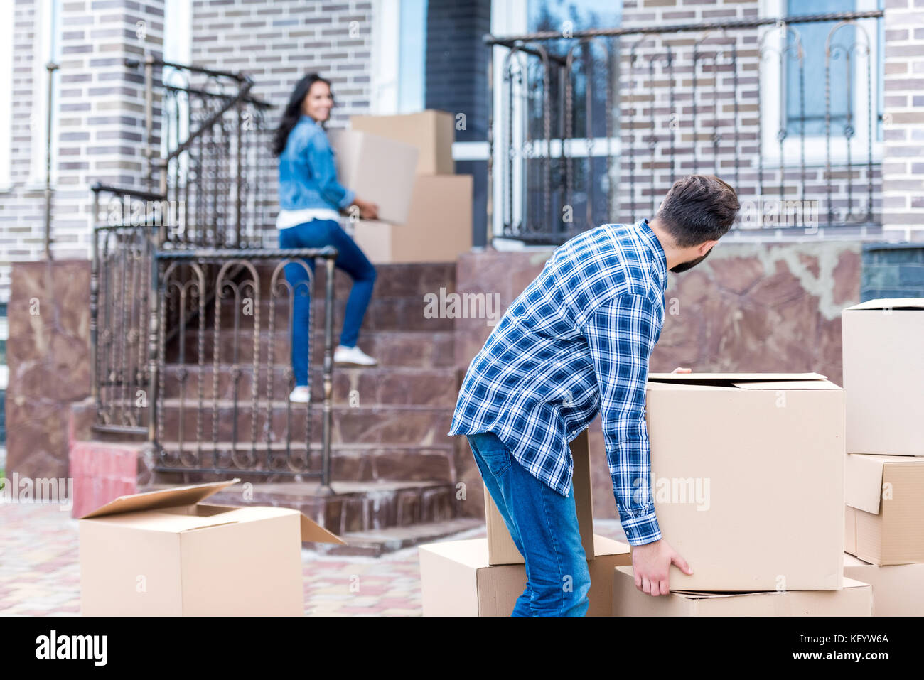 couple moving into new house Stock Photo - Alamy