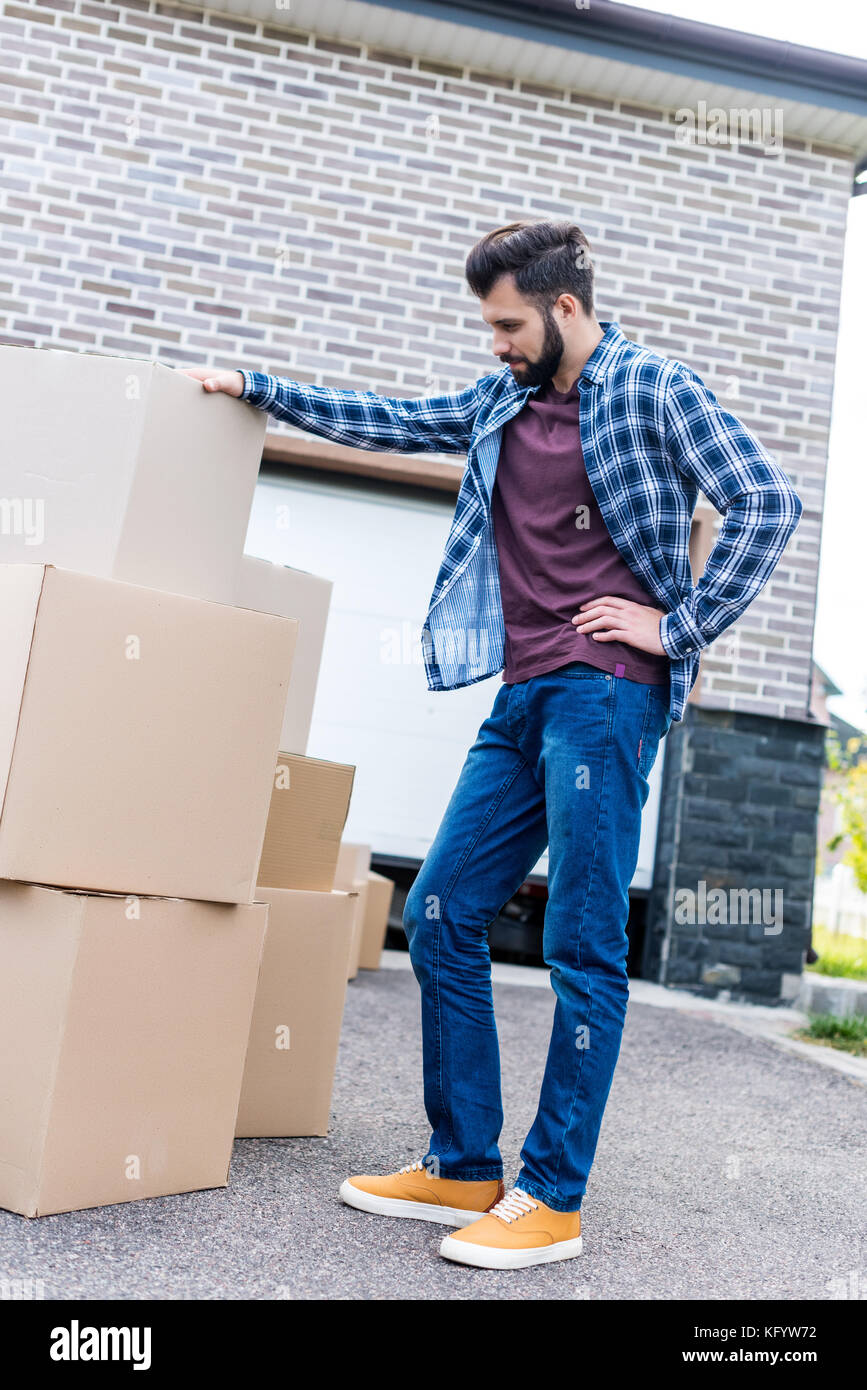 man moving into new house Stock Photo - Alamy