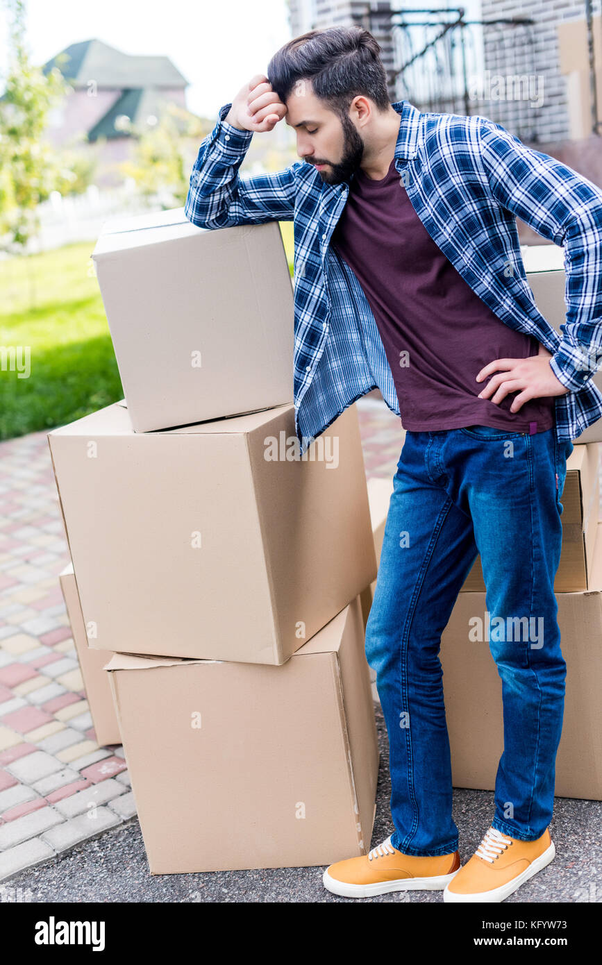 man moving into new house Stock Photo - Alamy