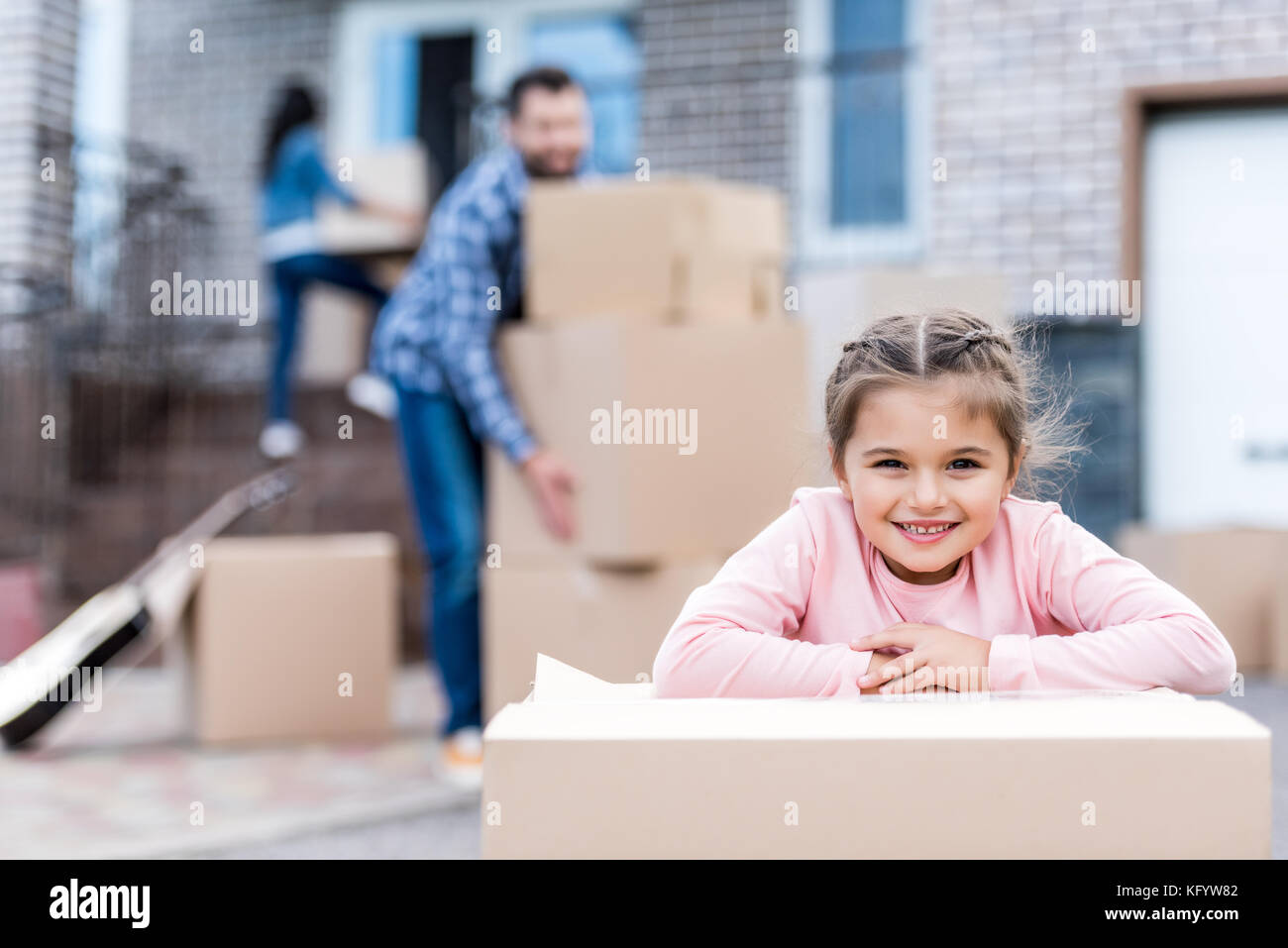 girl with cardboard box Stock Photo - Alamy