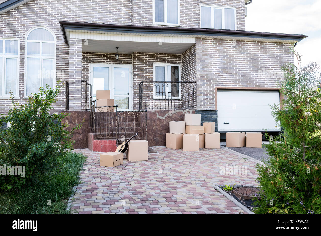 house with stacks of cardboard boxes Stock Photo - Alamy