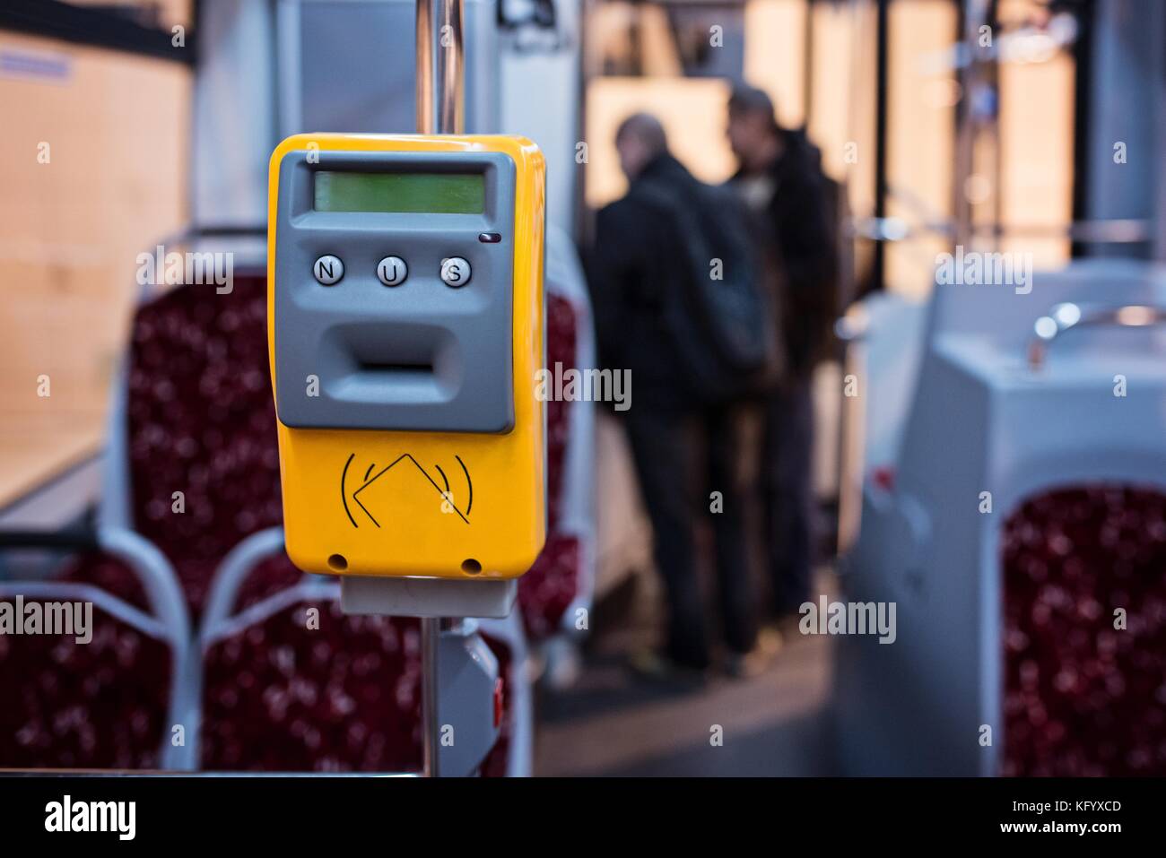 Ticket validator in modern city bus. Public transport Stock Photo - Alamy