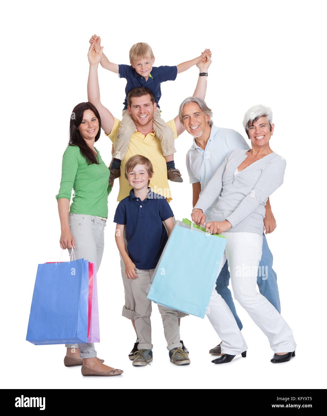 Happy generations family with shopping bags. Isolated on white Stock ...