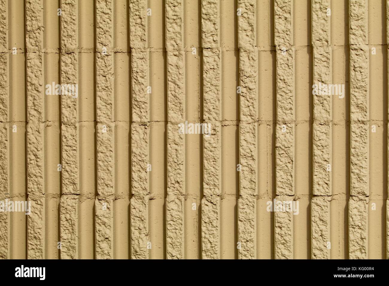 Vertical textured tan concrete Stock Photo - Alamy
