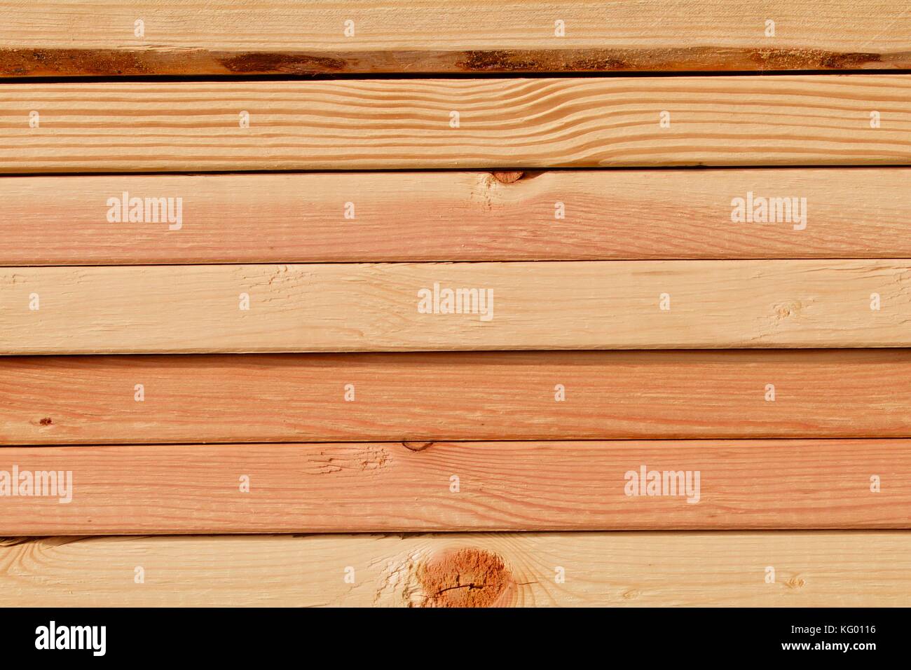 Stacked pine planks on side Stock Photo - Alamy