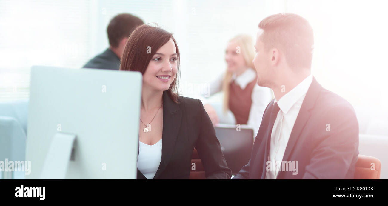 Business people working around table in modern office Stock Photo - Alamy