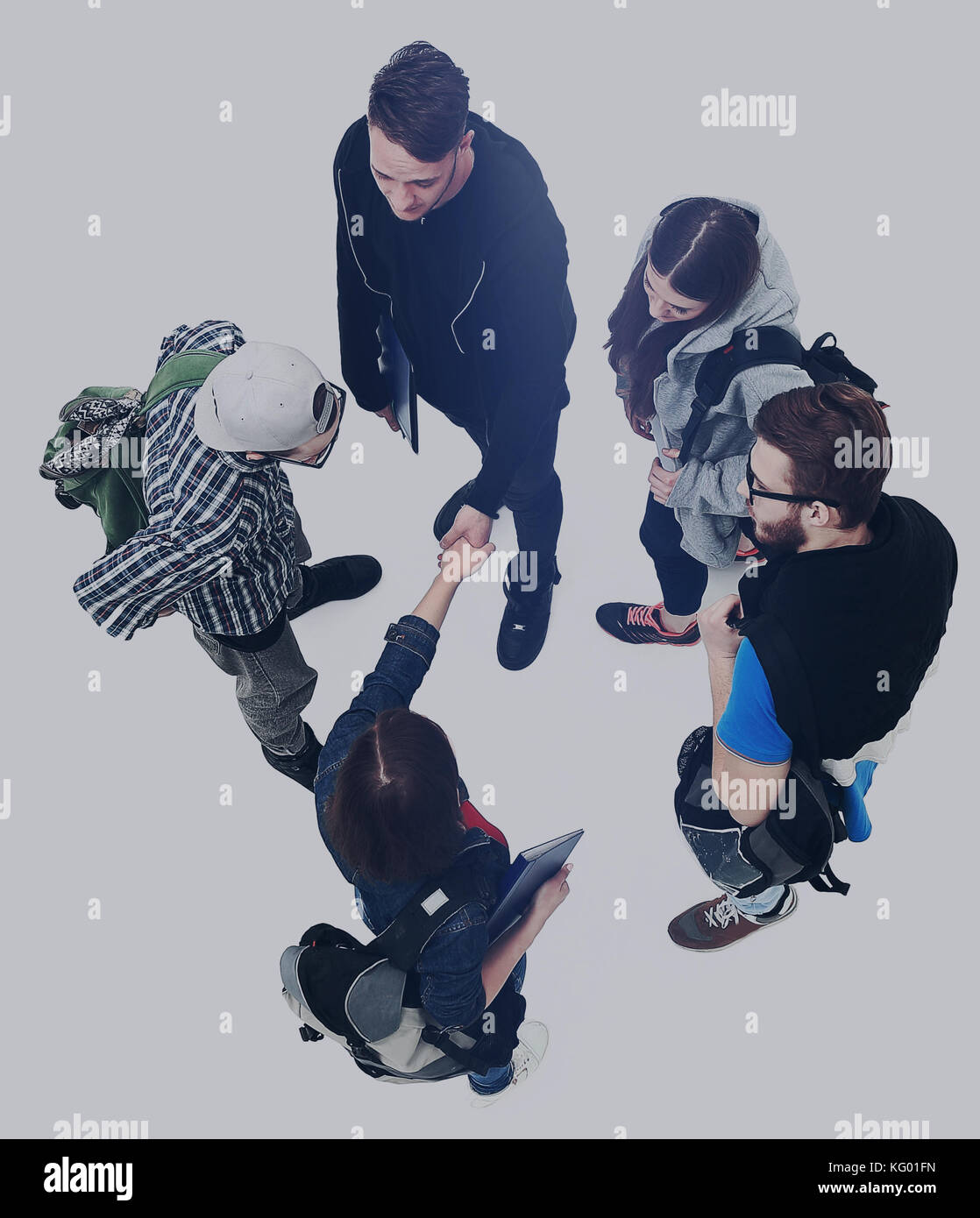 Top view. Happy smiling young group looking at camera Stock Photo - Alamy