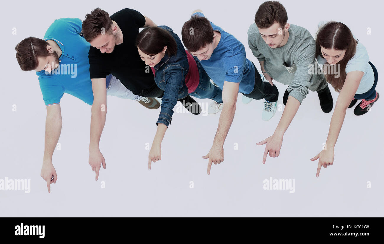 group of young people pointing at something Stock Photo - Alamy