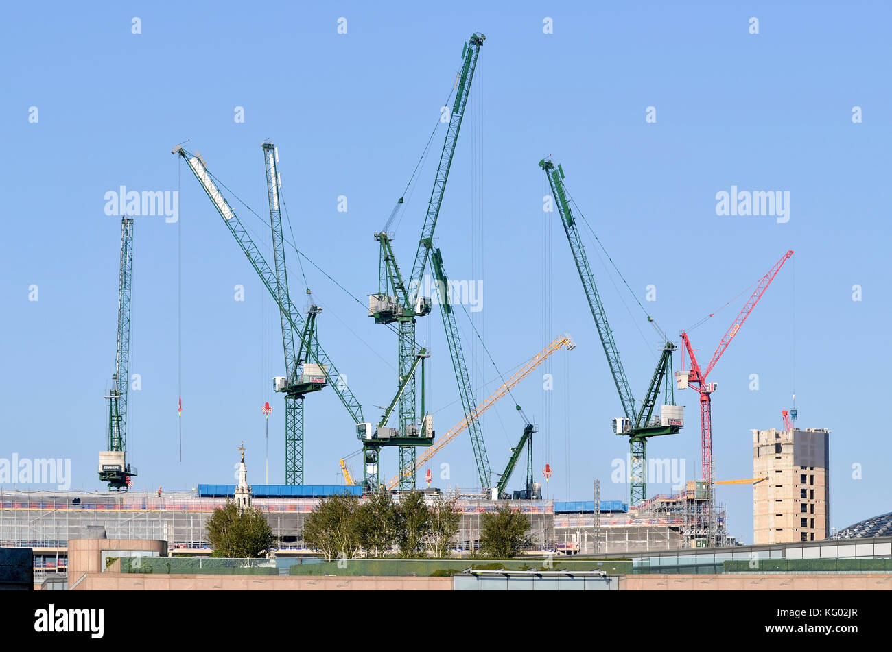 Cranes, London, UK. Tower cranes seen on the Bloomberg Place ...