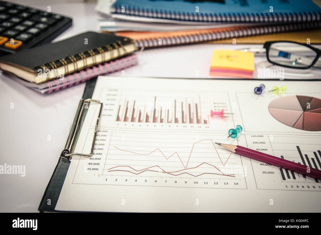business report and chart on table Stock Photo - Alamy