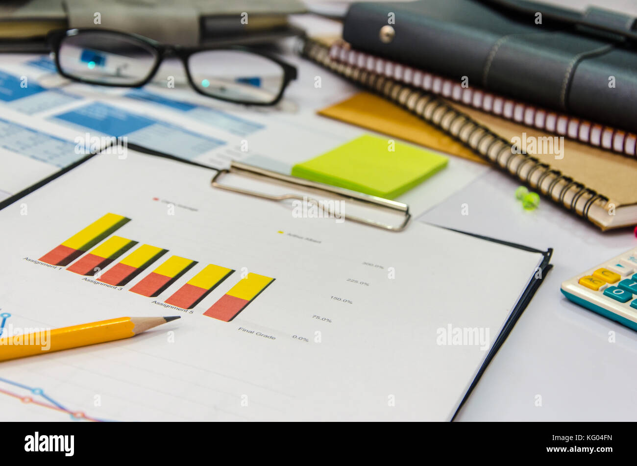 business report and chart on table Stock Photo - Alamy