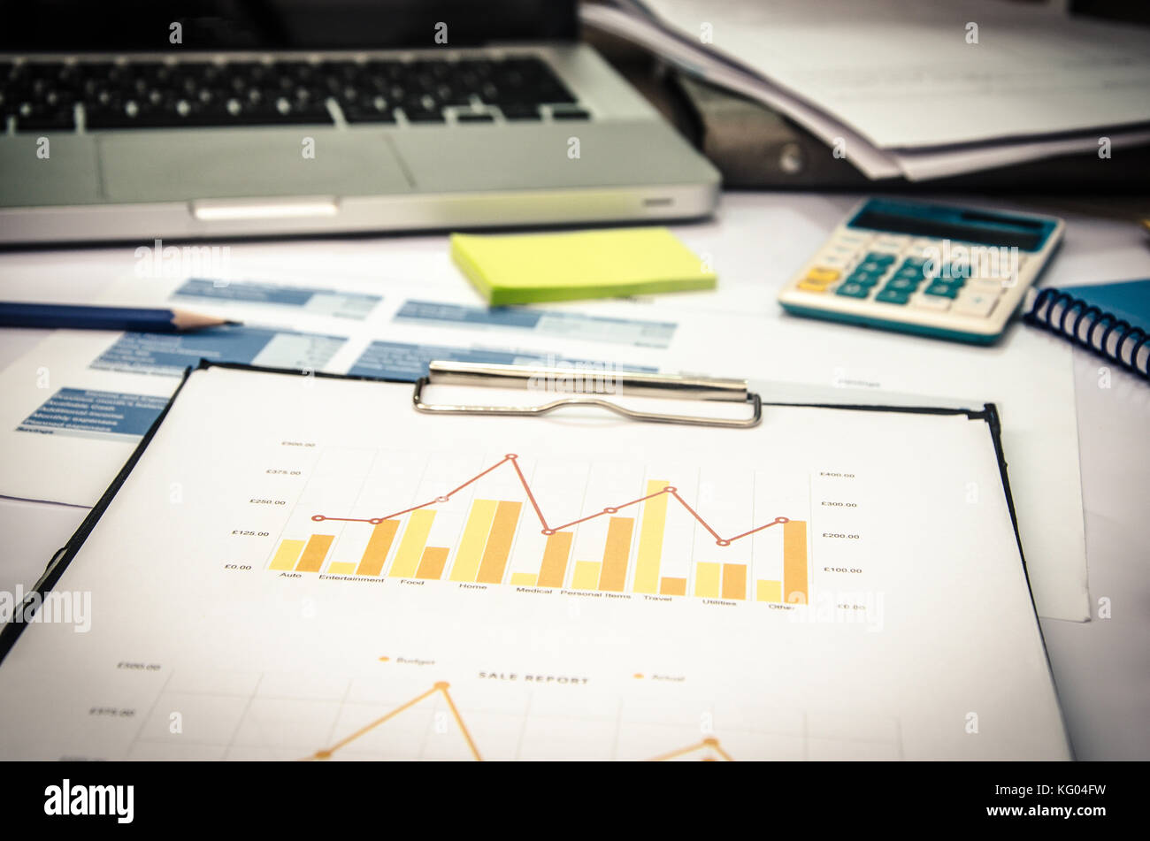 business report and chart on table Stock Photo - Alamy