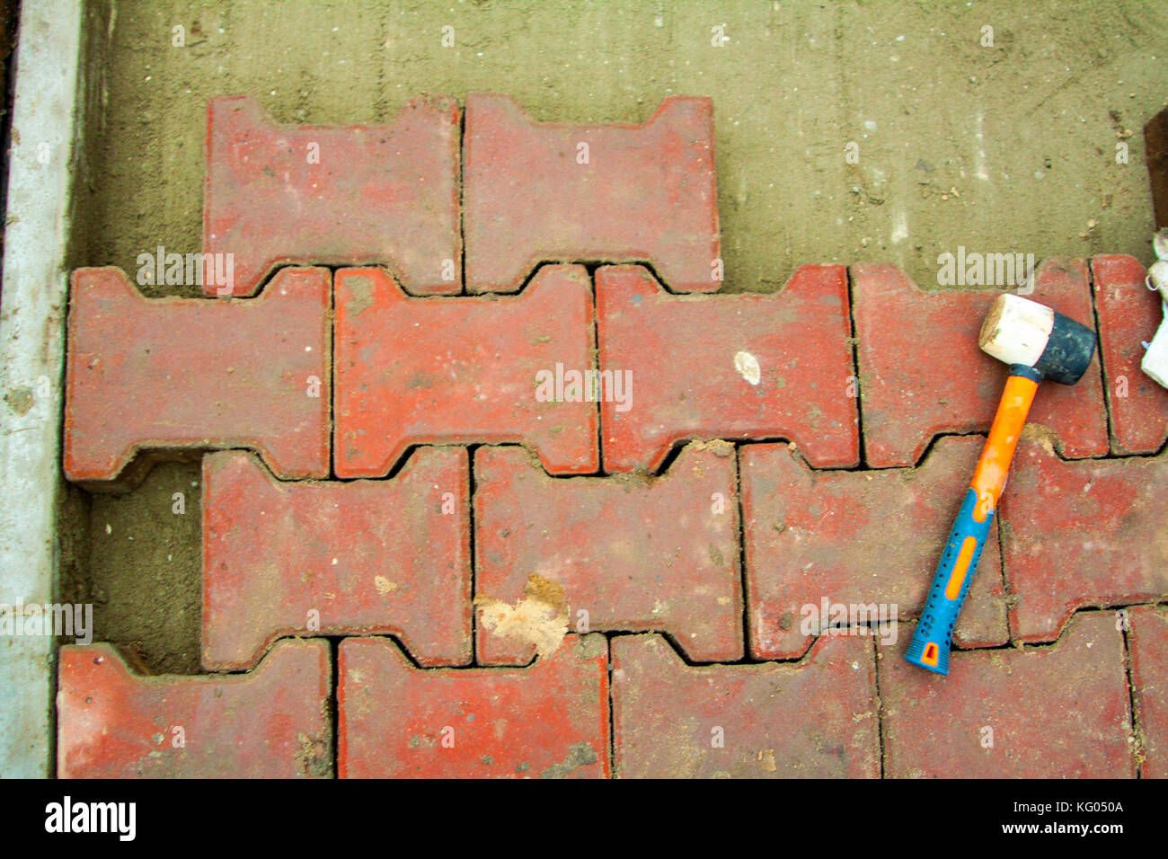 Laying Paving Slabs by mosaic close-up Stock Photo - Alamy