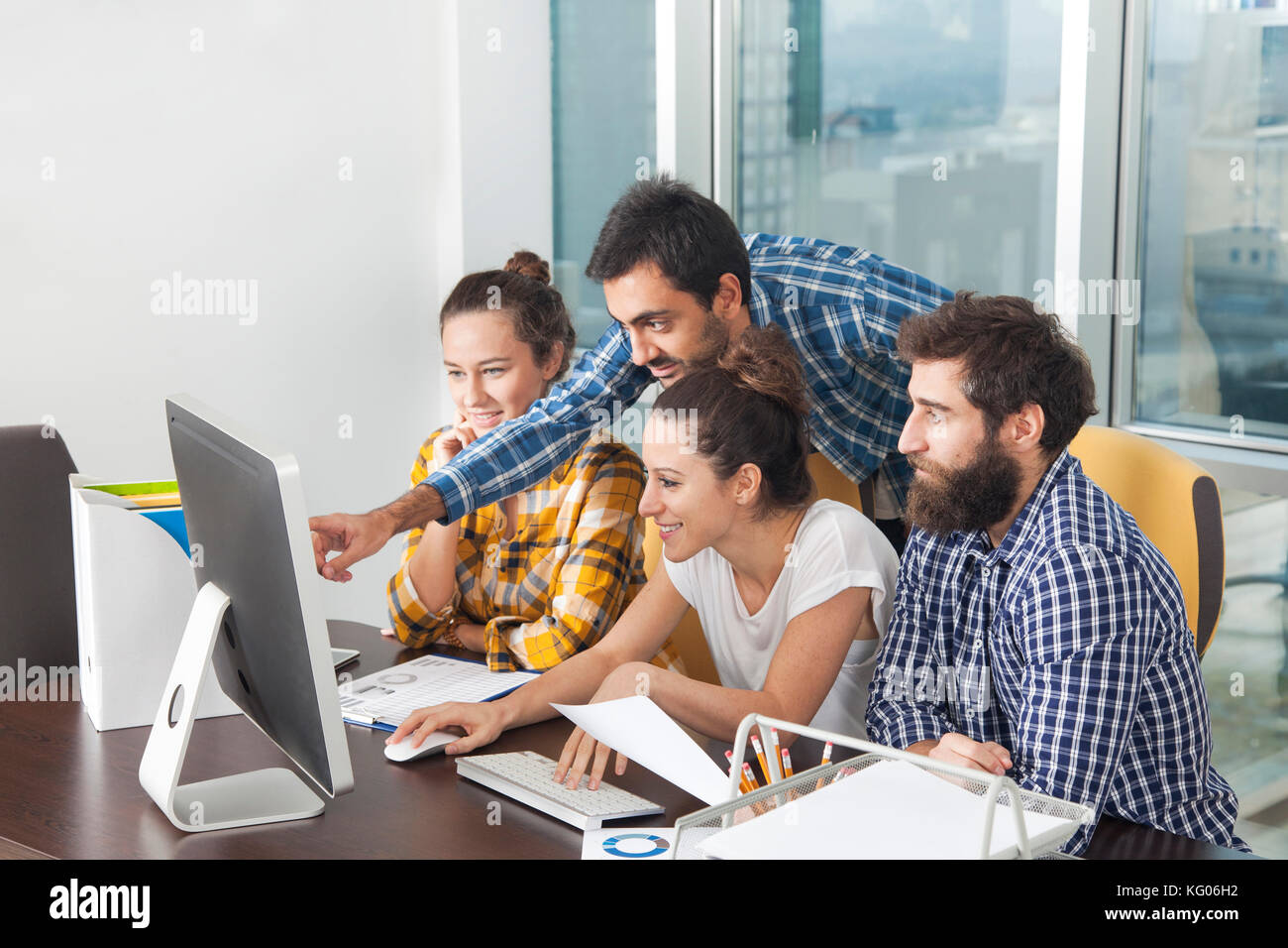 Group of happy creative people working in the office Stock Photo - Alamy