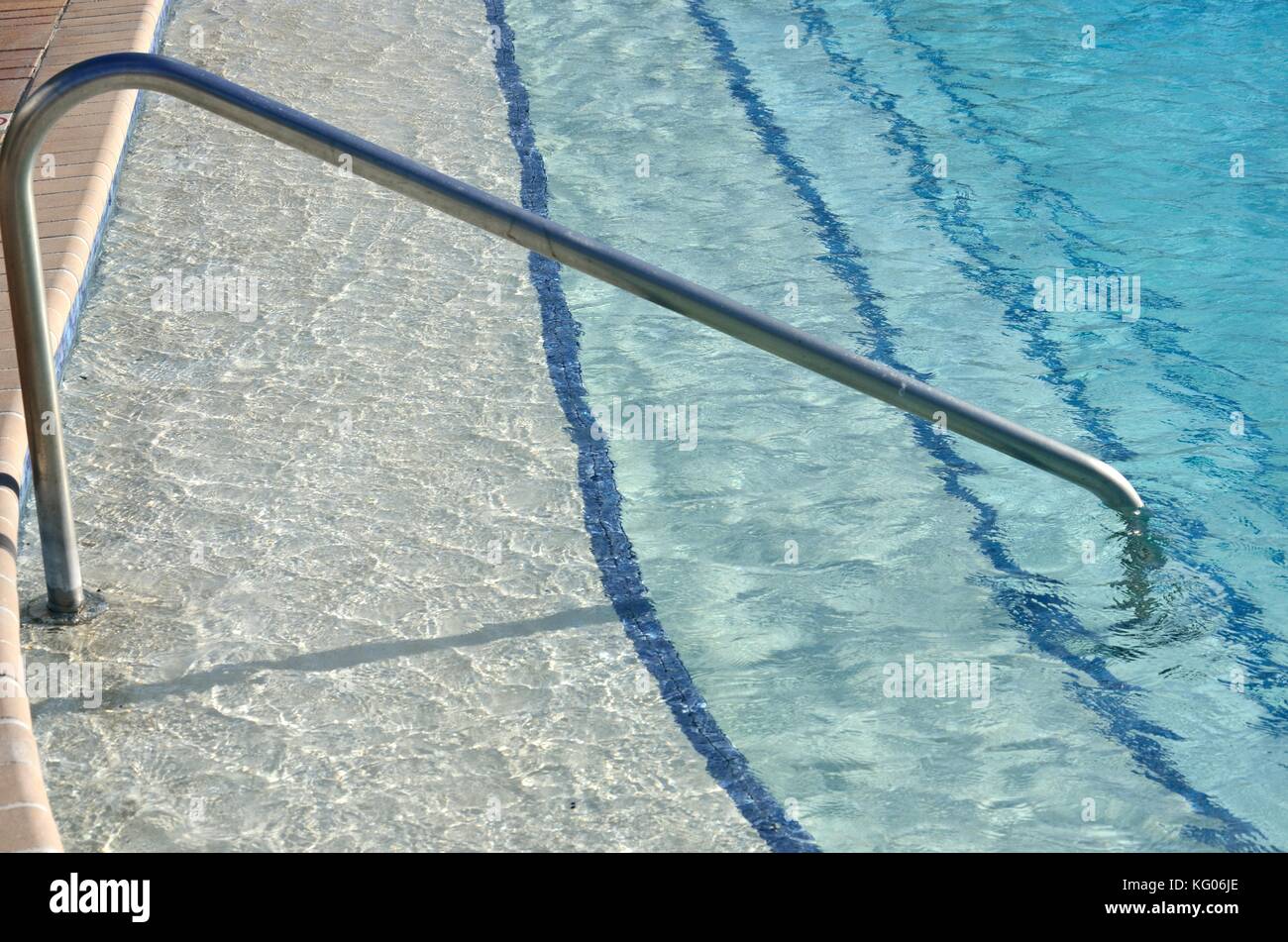 Steps into swimming pool Stock Photo - Alamy