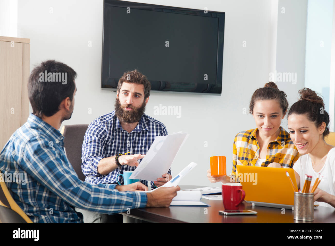 Group of happy creative people working in the office Stock Photo - Alamy