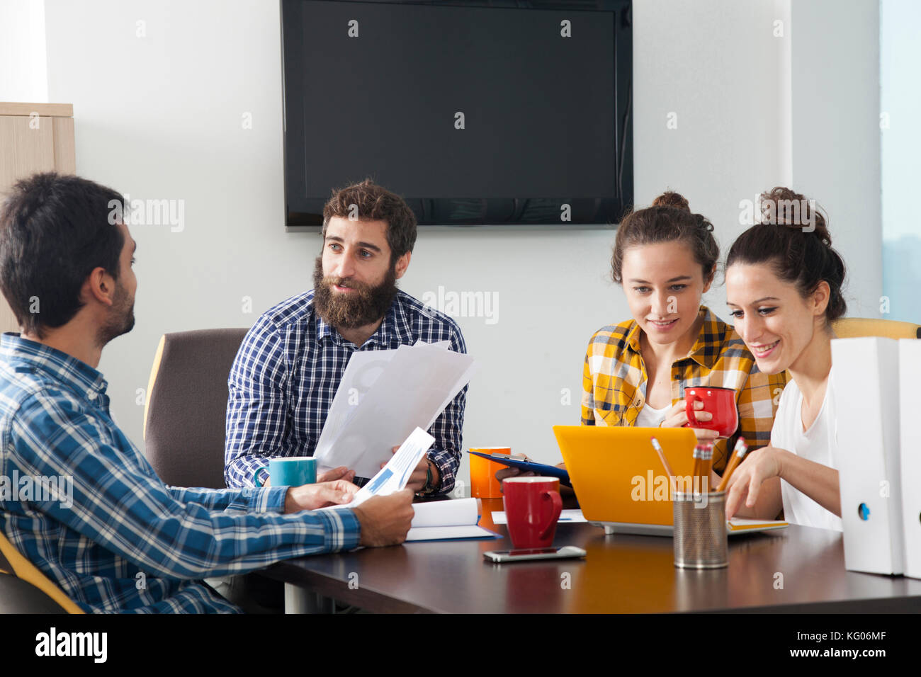 Group of happy creative people working in the office Stock Photo - Alamy